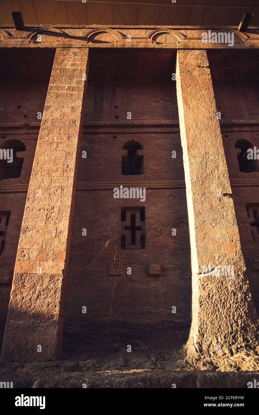 Ancient rock hewn church exterior carved windows crosses stone hi-res ...