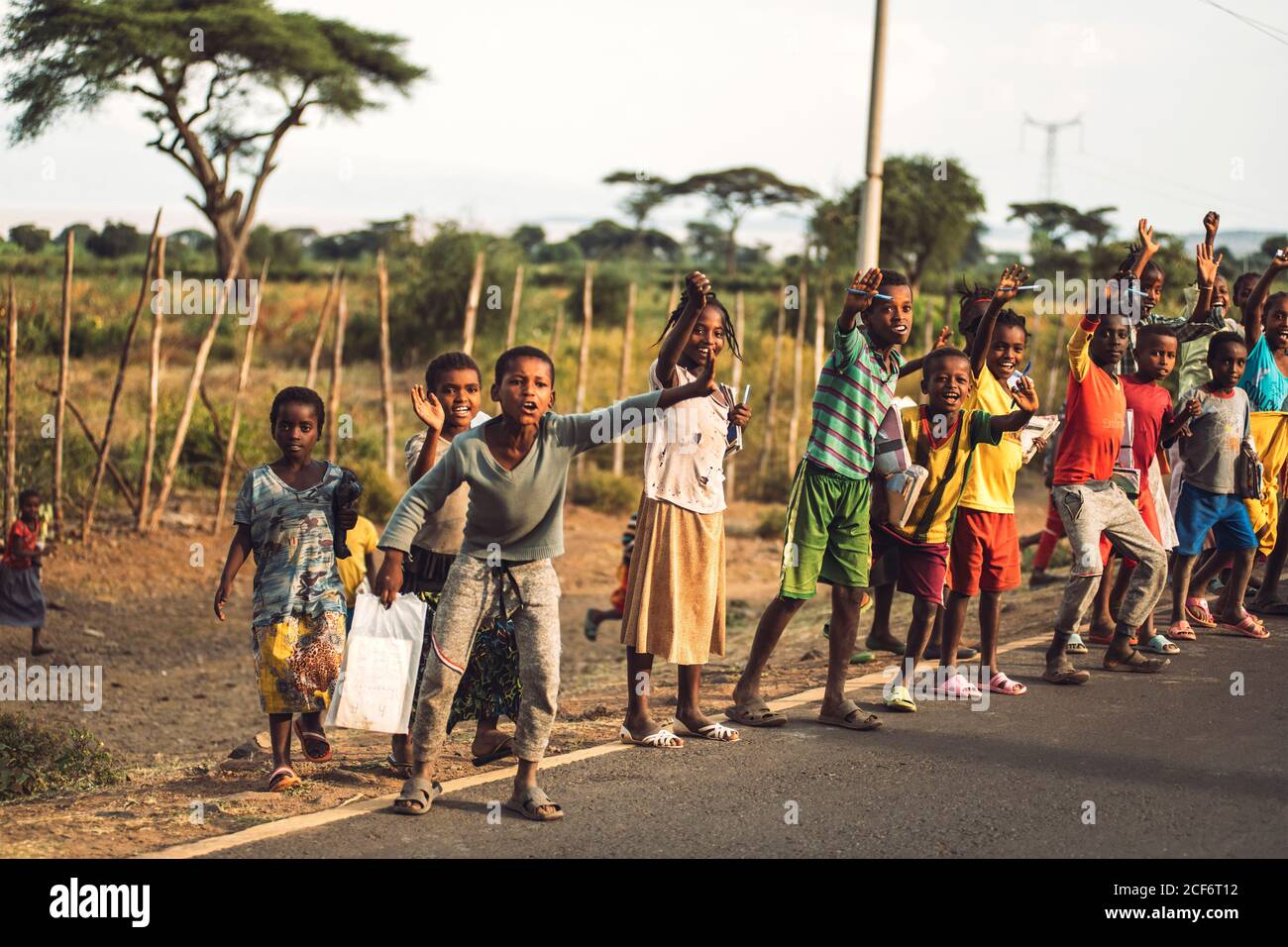 Children waving hands hi-res stock photography and images - Alamy