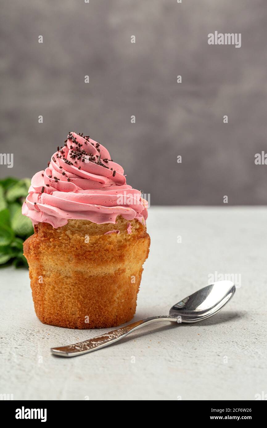 Delicious homemade cupcakes on rustic background Stock Photo - Alamy