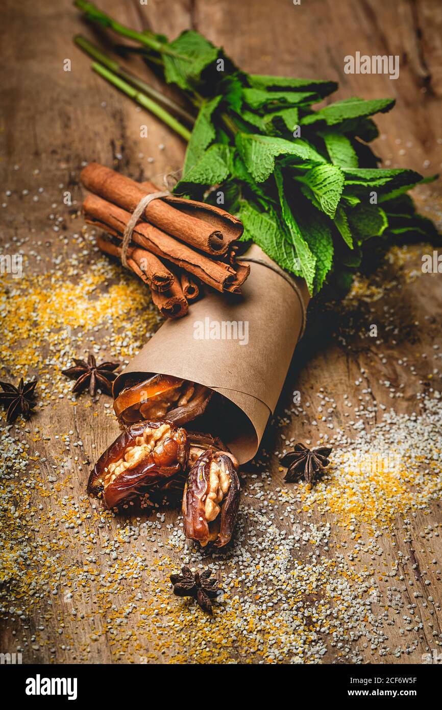 Dates fruits with walnuts, mint and cinnamon muslim halal snack for ...
