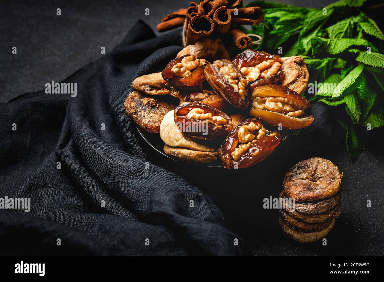 Dates fruits and dried figs with walnuts, mint and cinnamon muslim ...
