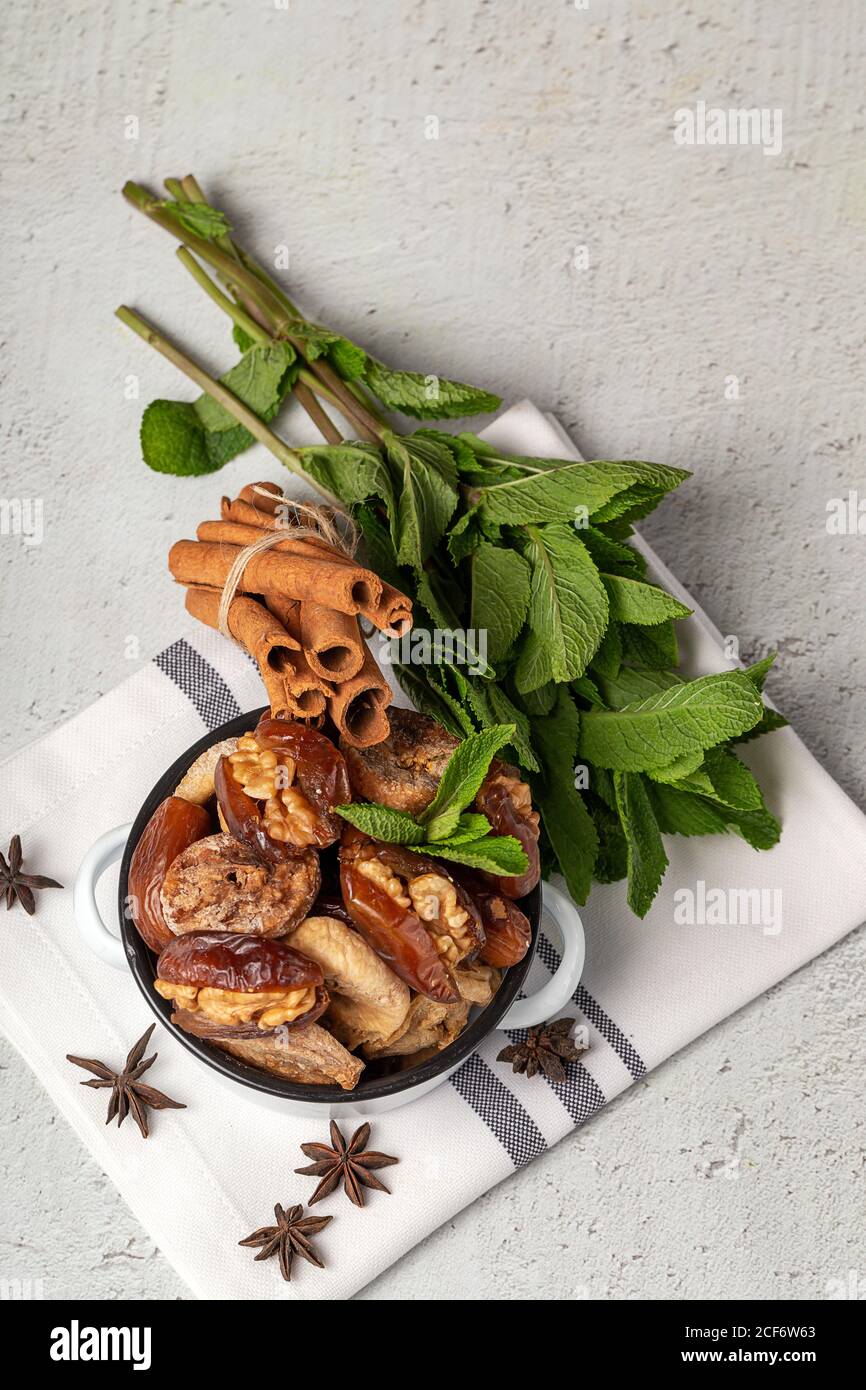 Dates fruits with walnut sand dried figs, mint and cinnamon muslim ...