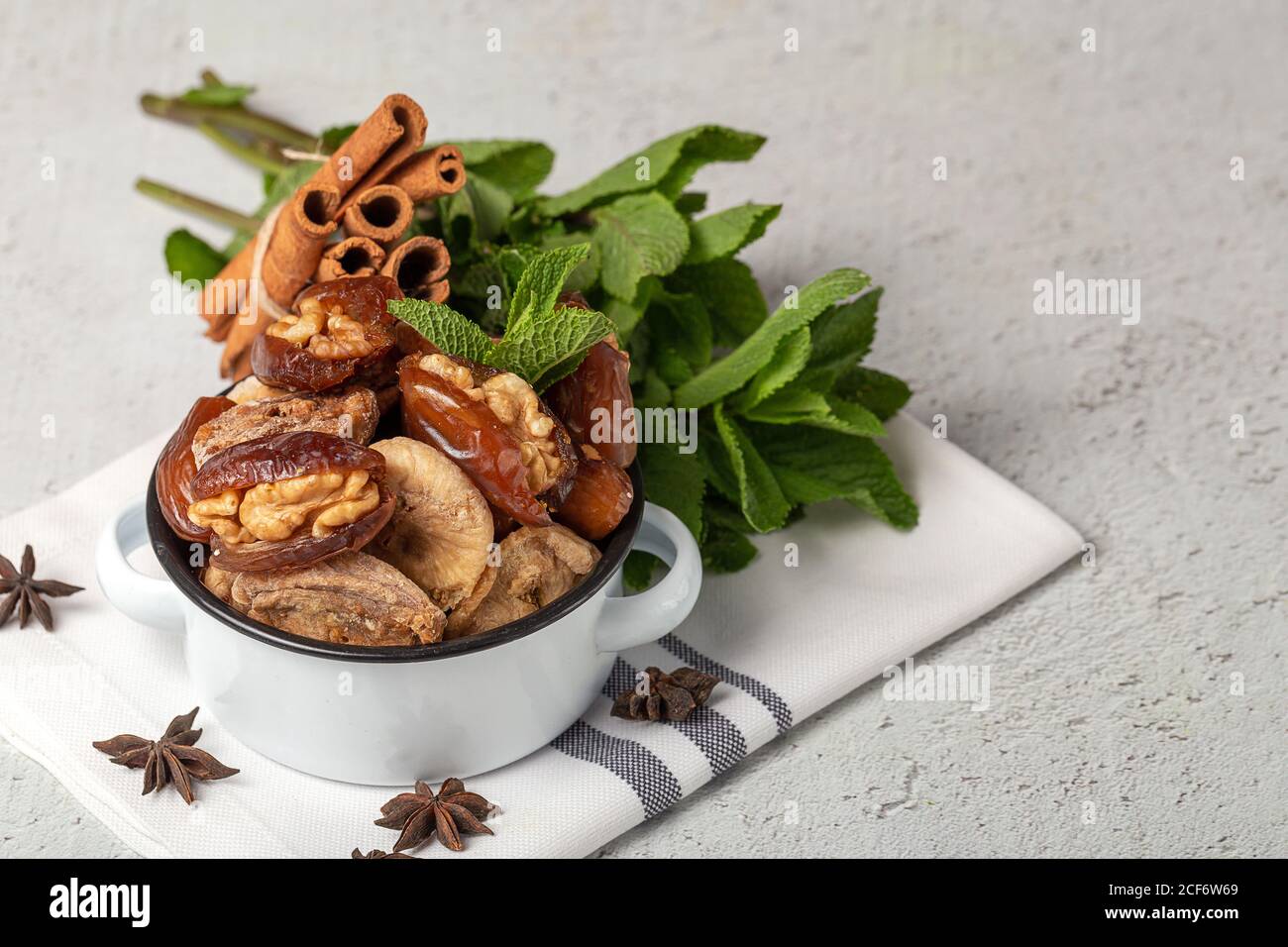 Dates fruits with walnut sand dried figs, mint and cinnamon muslim ...