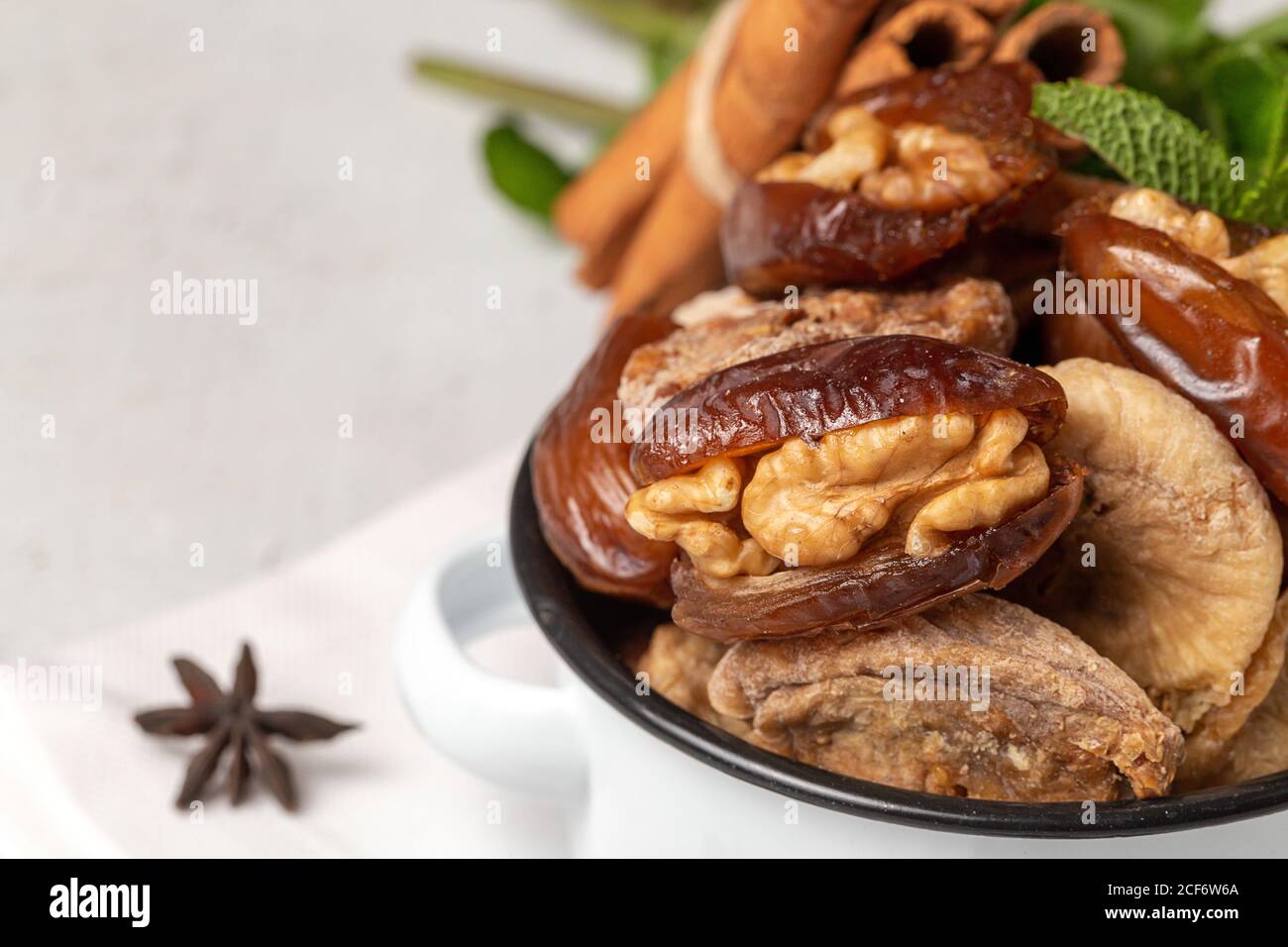 Dates fruits with walnut sand dried figs, mint and cinnamon muslim ...