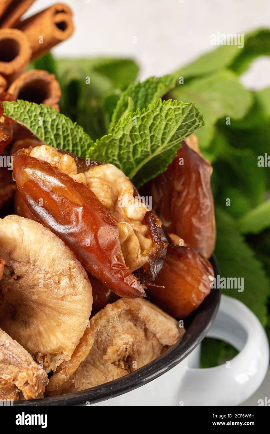Dates fruits with walnut sand dried figs, mint and cinnamon muslim ...