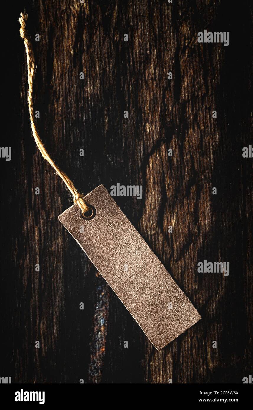 Natural leather labels for price or advertising on dark background ...