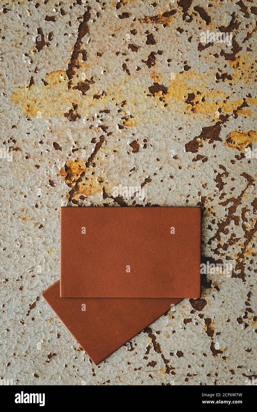 Natural leather labels for price or advertising on rusty background ...