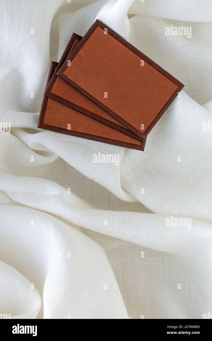 Natural leather labels for price or advertising on white background ...