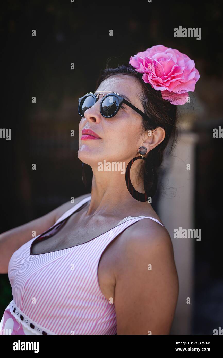 Eccentric Woman in colorful pink costume on summer street Stock Photo ...