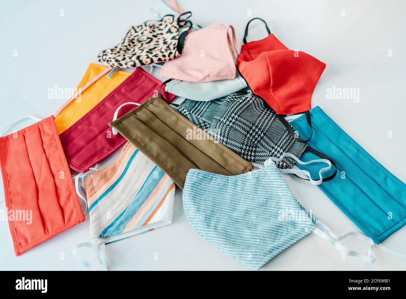 Face mask protective COVID-19 prevention cloth mouth coverings. Messy ...