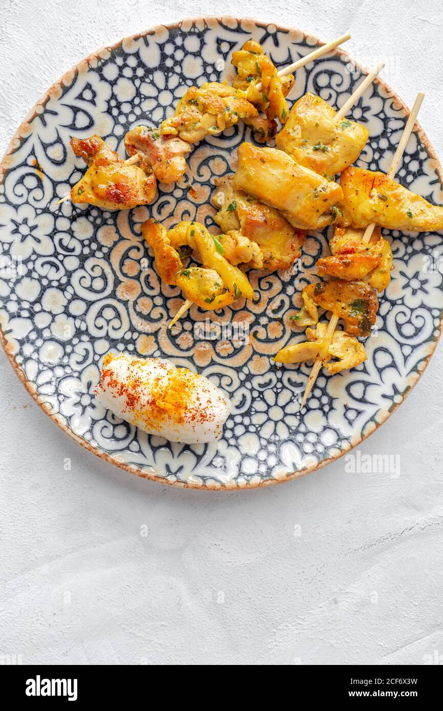 Homemade Moorish skewers with rice of meat with spices. Typical ...