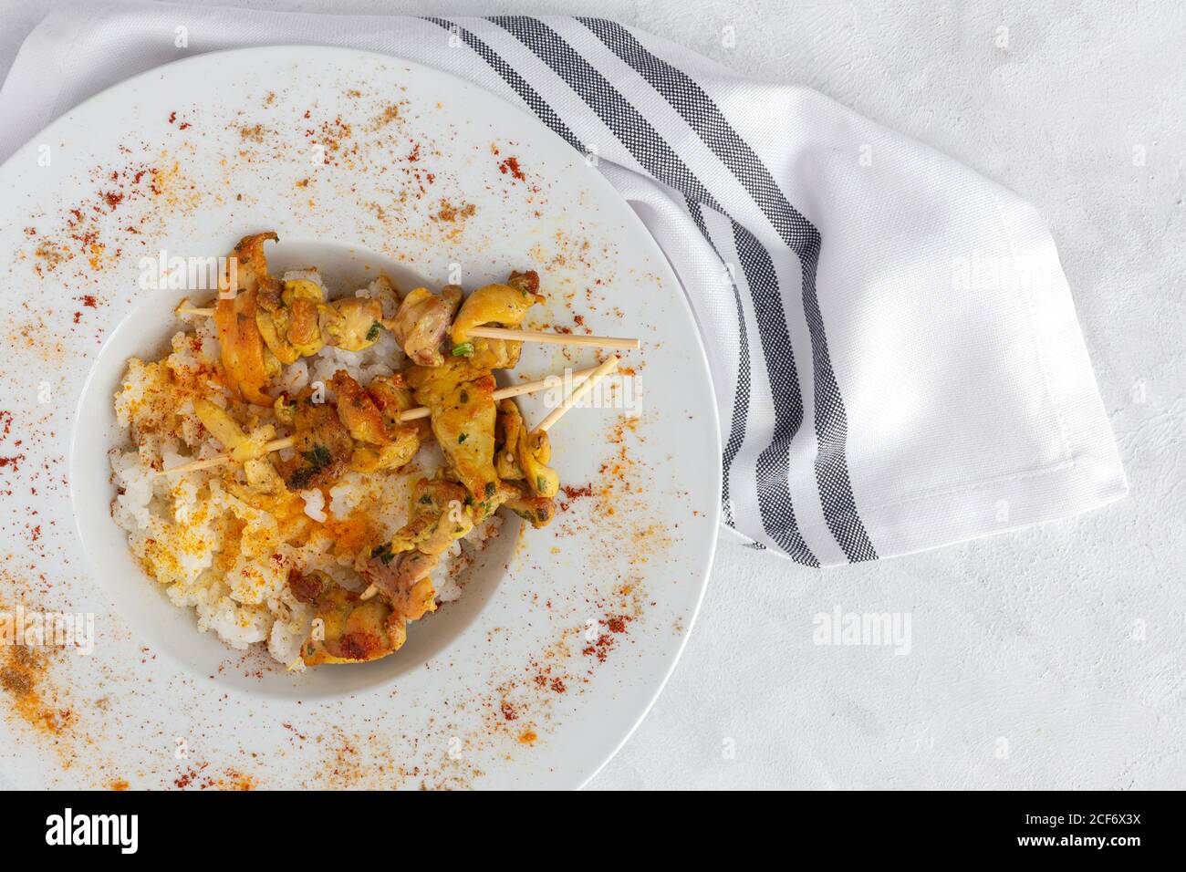 Homemade Moorish skewers with rice of meat with spices. Typical ...