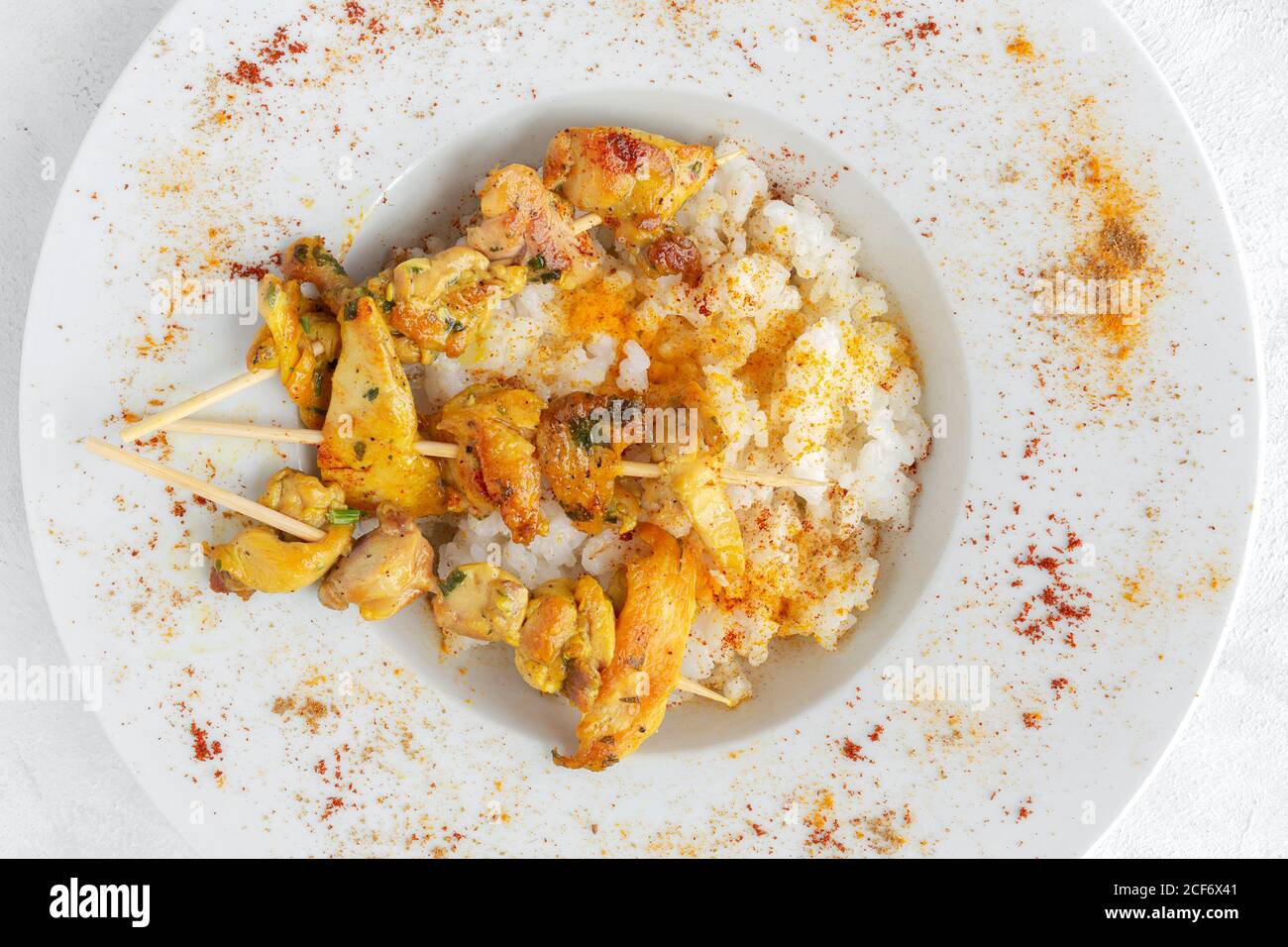 Homemade Moorish skewers with rice of meat with spices. Typical ...