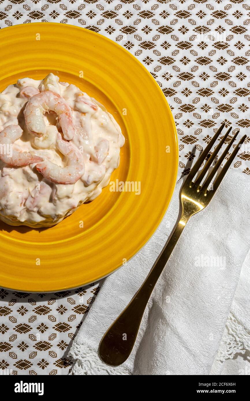Traditional Russian homemade salad with potatoes, mayonnaise sauce ...
