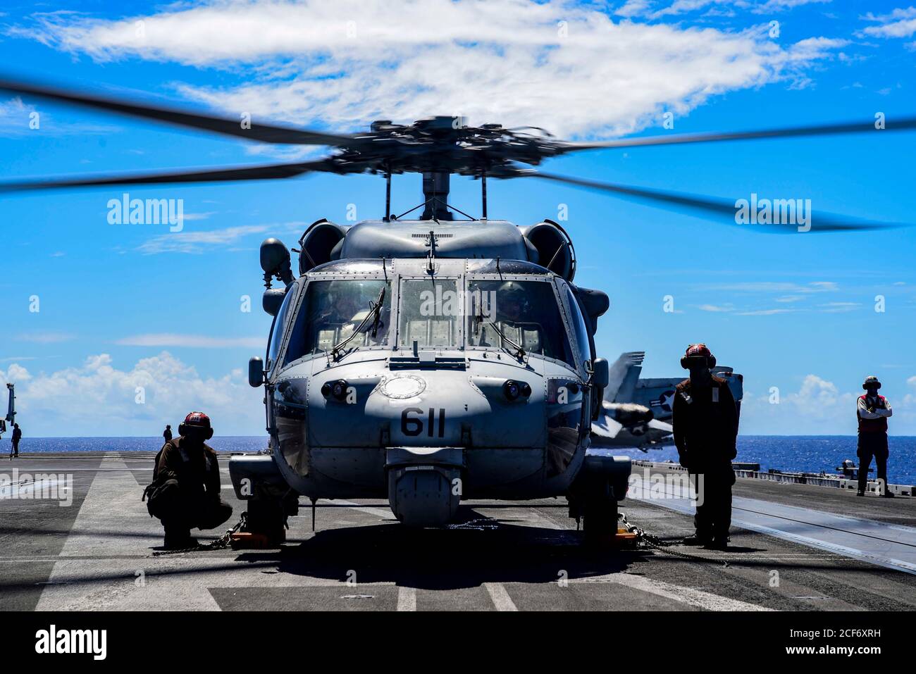 200902-N-RF825-1014 PHILIPPINE SEA (Sep. 2, 2020) An MH-60S Sea Hawk ...