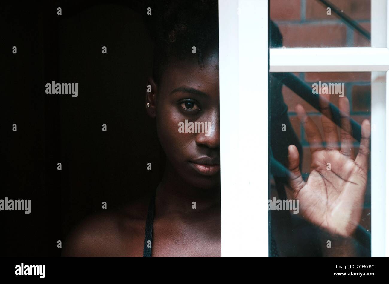 Portrait of African American mysterious disappointed resentful sad ...