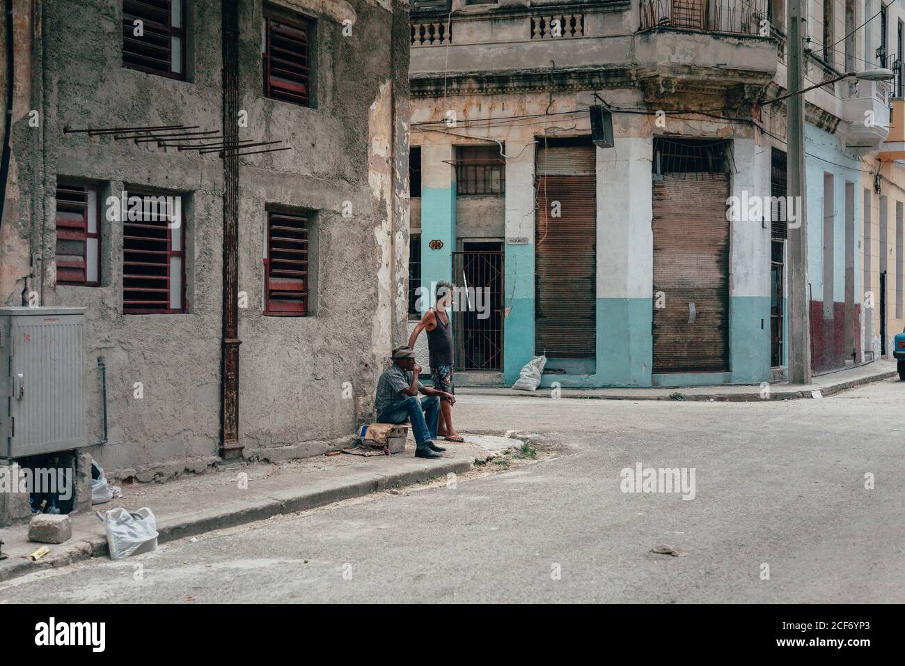 Havana, Cuba - DECEMBER 14, 2019: Typical city street with old colonial ...