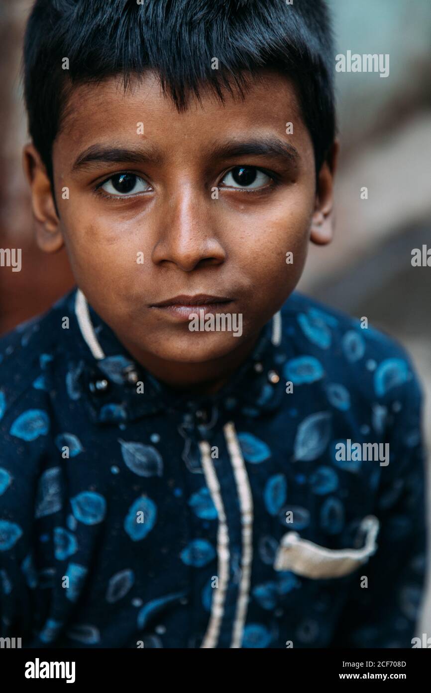 Varanasi, India - FEBRUARY, 2018: Serious Indian boy from poor family ...