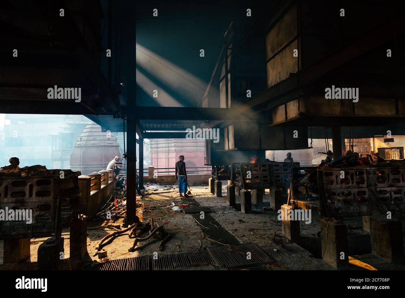 Indian men setting fire pyre hi-res stock photography and images - Alamy