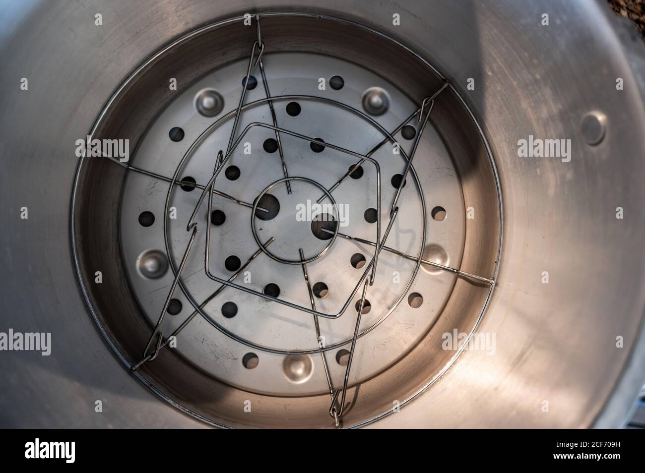 Old fashioned method of preserving food by canning and pressure cooking ...