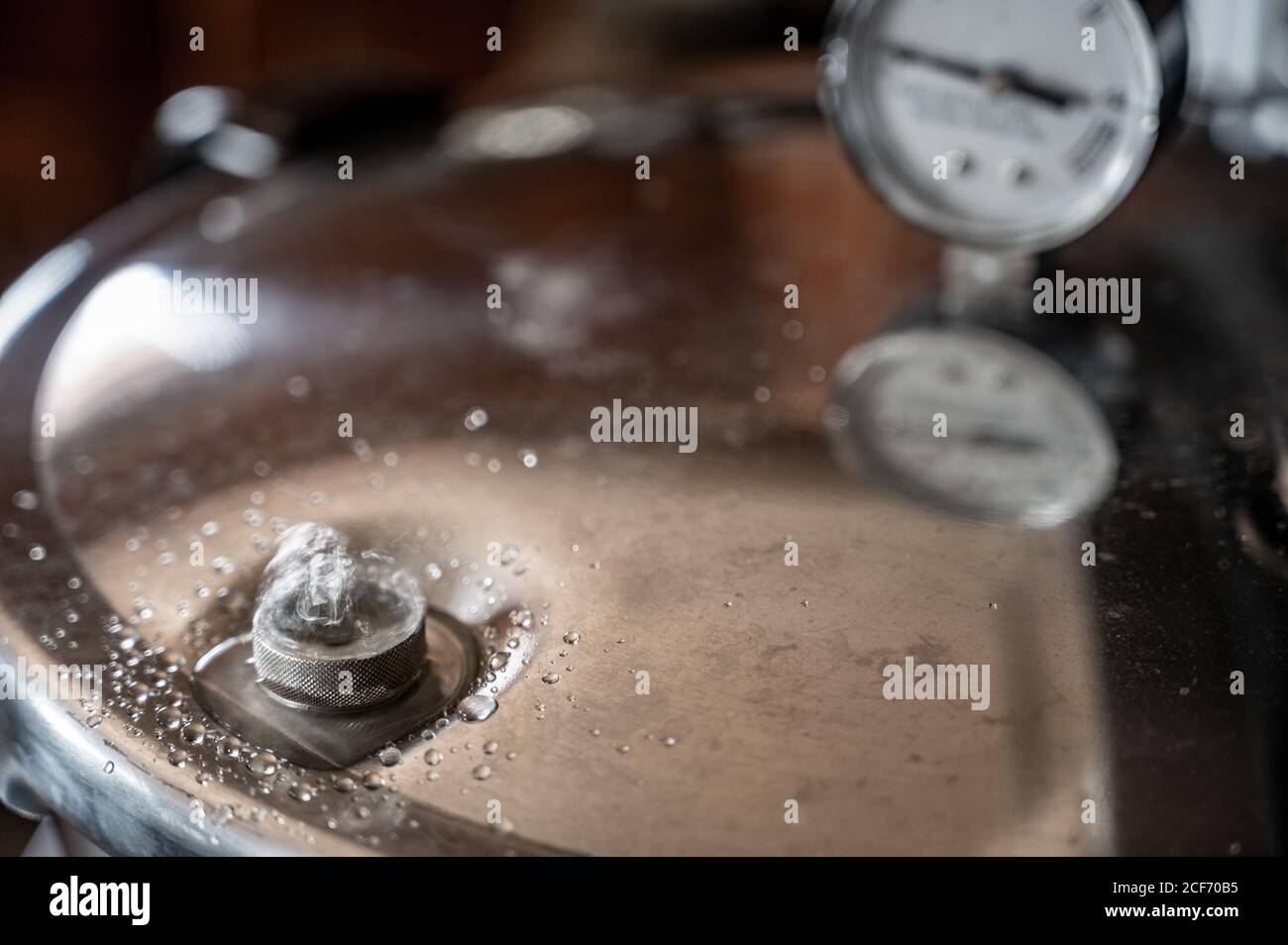 Old fashioned method of preserving food by canning and pressure cooking ...