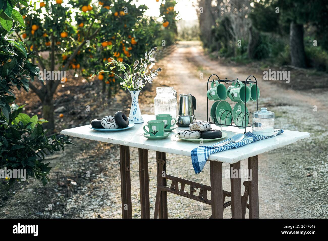 Picnic with yummy dessert and aromatic coffee in garden Stock Photo - Alamy