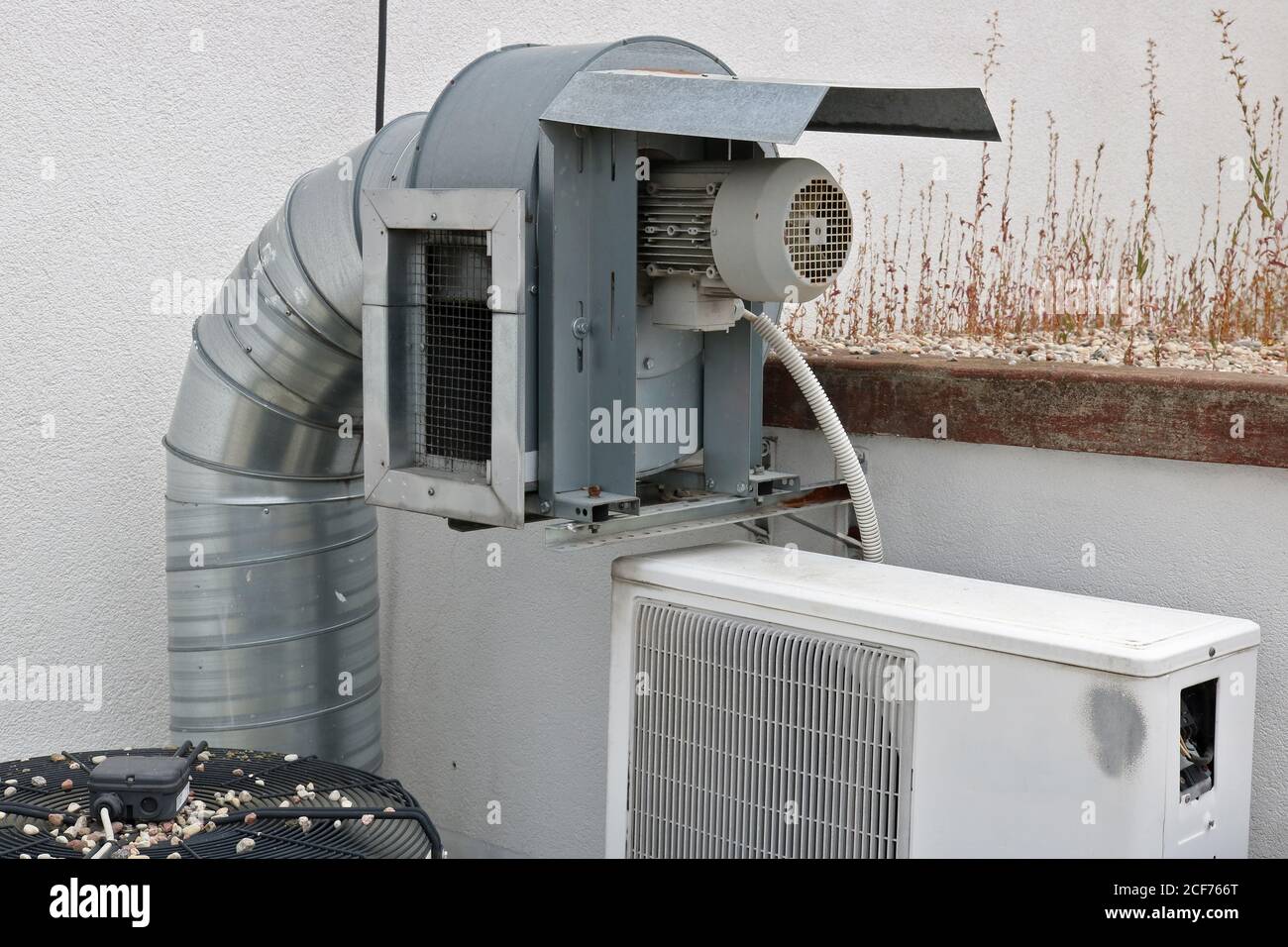 Electric motor for ventilation and air conditioner mounted on the wall ...
