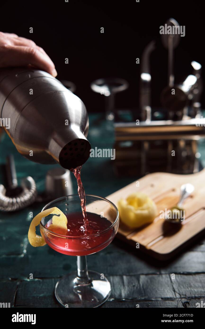 Hand cocktail glass spill hi-res stock photography and images - Alamy