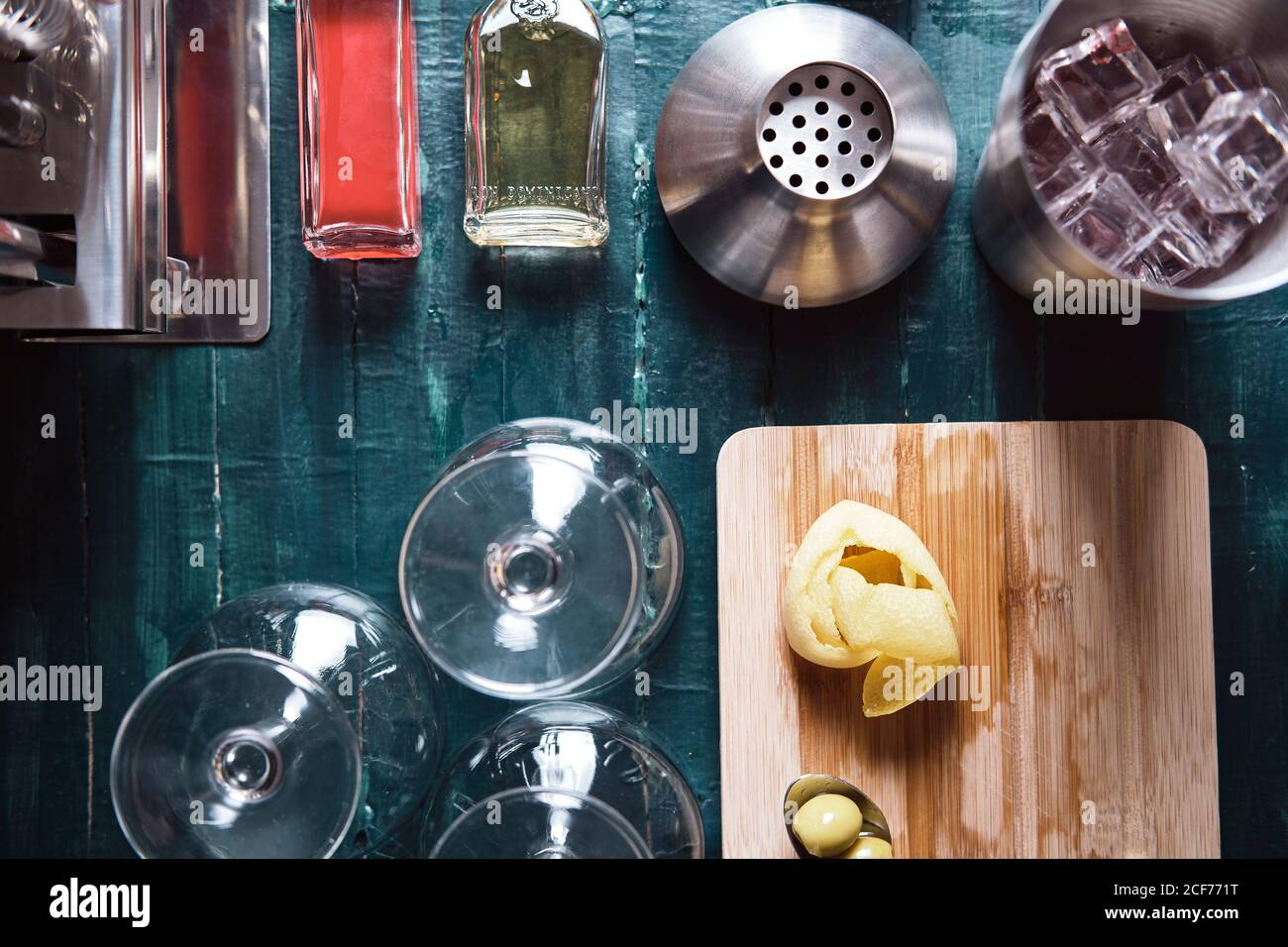 Top view composition of bottles with alcohol drinks and products for ...