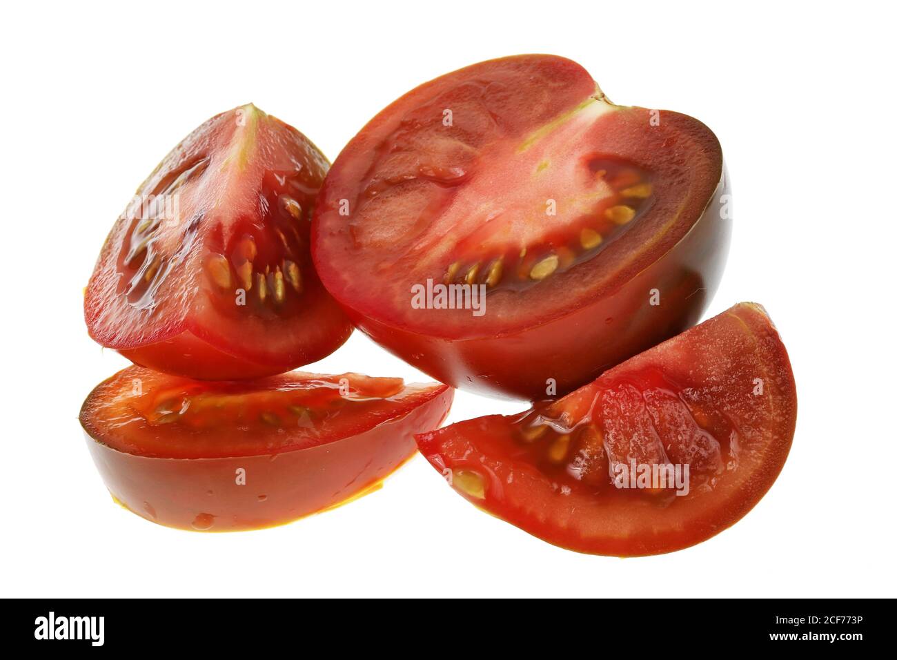 Food of the future concept - small slices of dark red tomato. Isolated ...