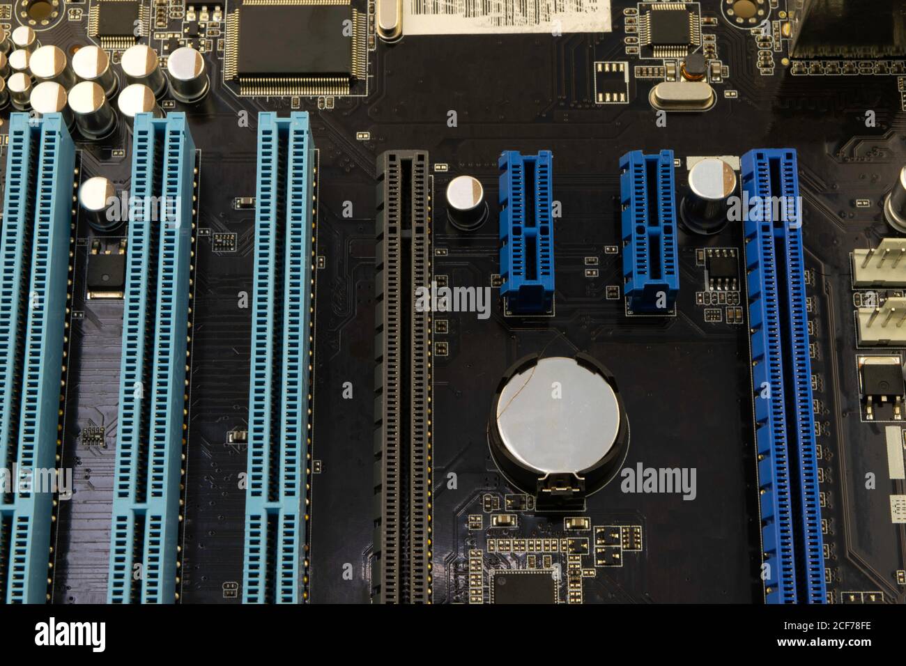 computer motherboard, with processor and other parts installed on it ...