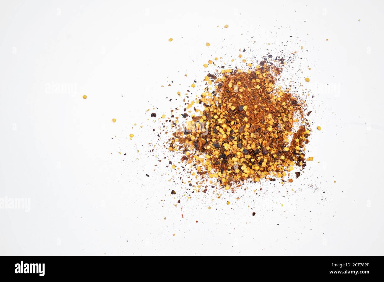 Red hot Chili pepper powder on white background Stock Photo - Alamy
