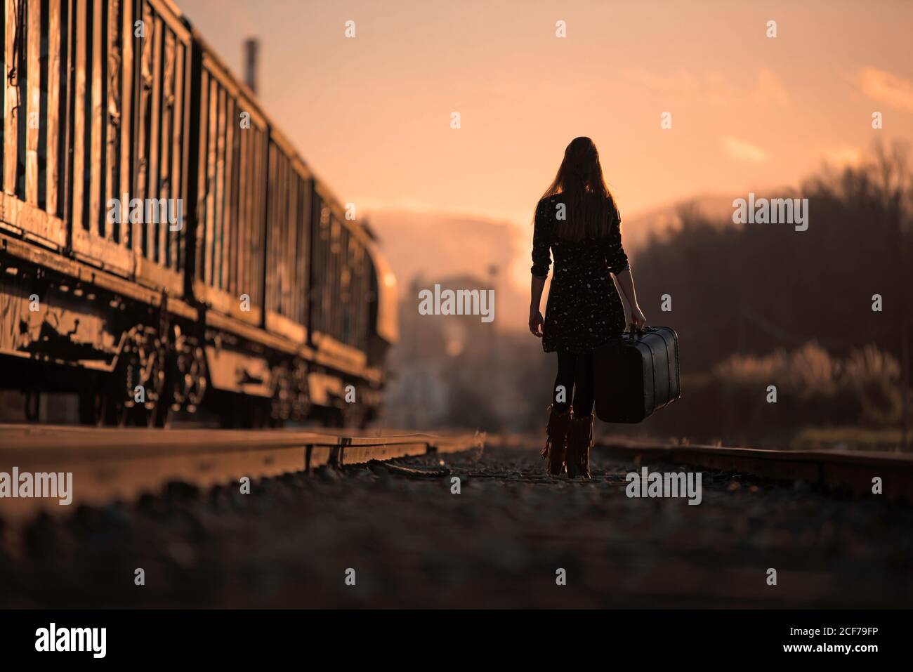 Woman hitchhike back view hi-res stock photography and images - Alamy
