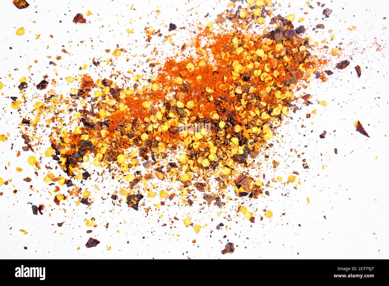 Red hot Chili pepper powder on white background Stock Photo - Alamy