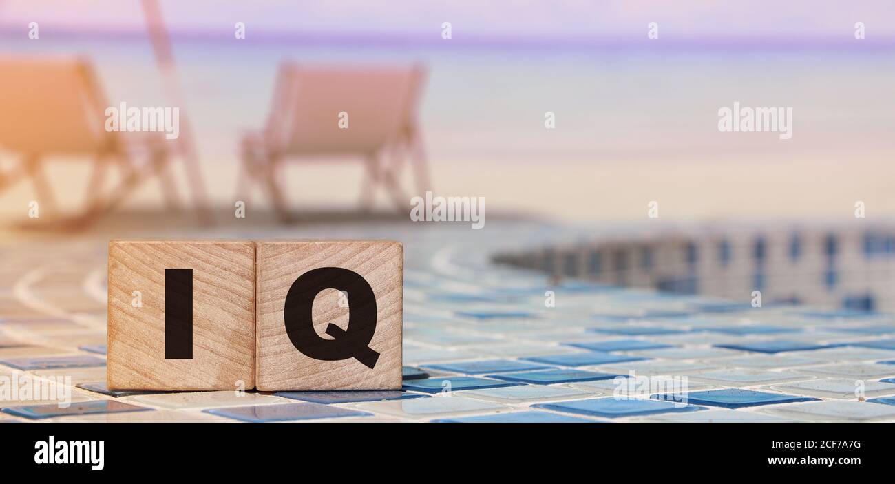 IQ word concept on wooden cube. Intelligence symbol. Brain or talent ...