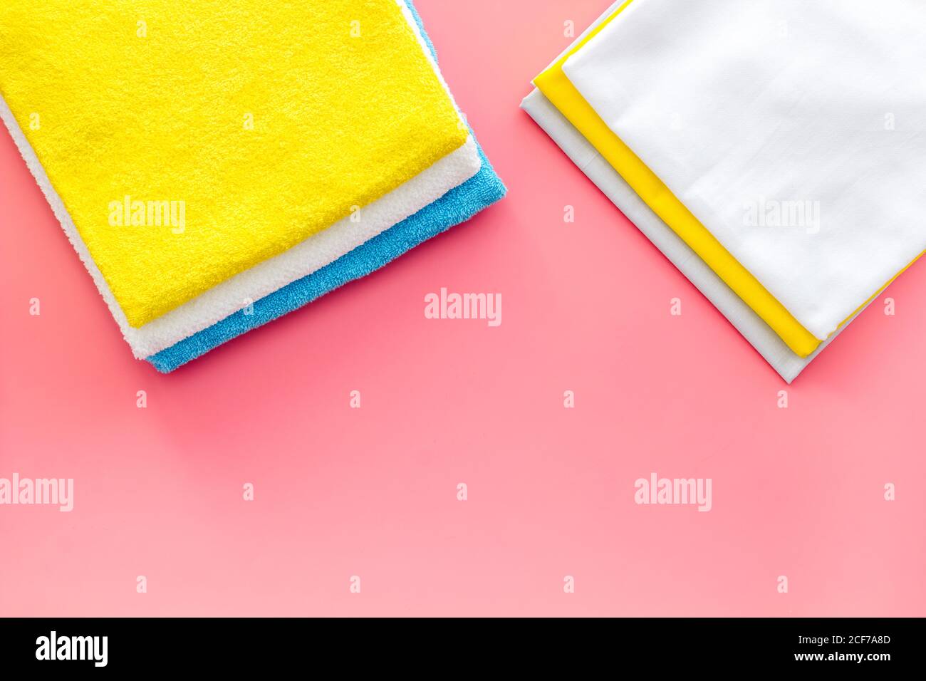 Clean laundry - clothes and towels top view Stock Photo - Alamy