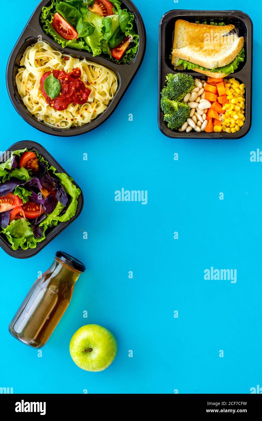 Lunch boxes with meal. Food delivery concept. Overhead view Stock Photo ...