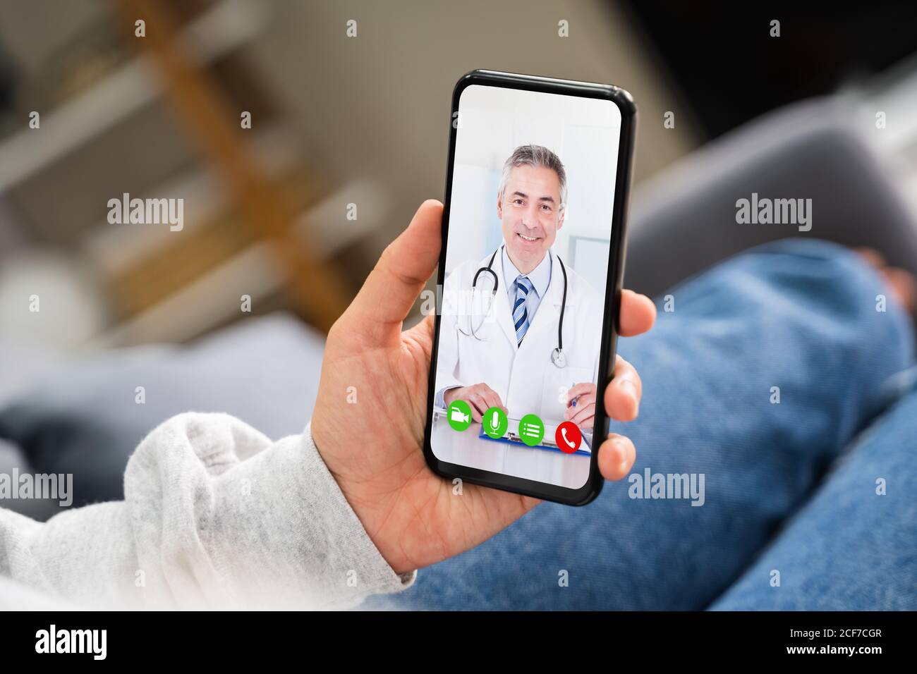 Telemedicine Video Call To Doctor On Smartphone Stock Photo - Alamy