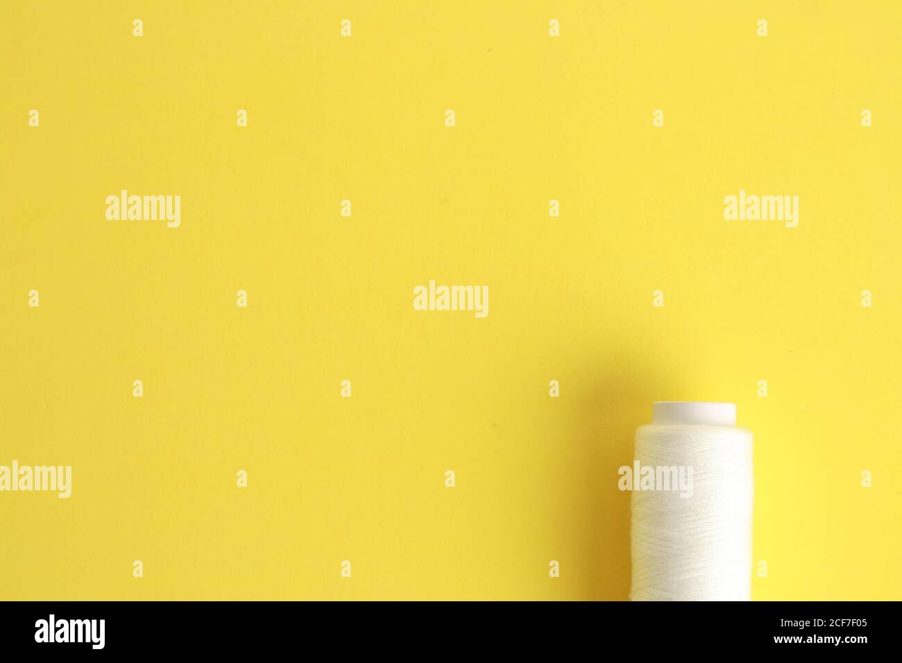 Top view of the white sewing thread Stock Photo - Alamy