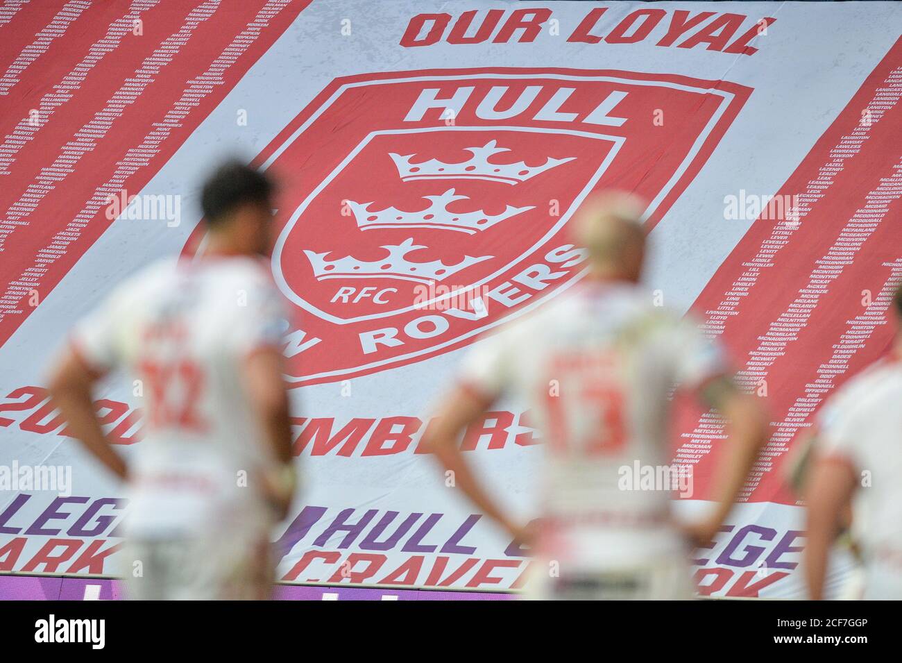 Hull Kingston Rovers players in front of flag Stock Photo - Alamy