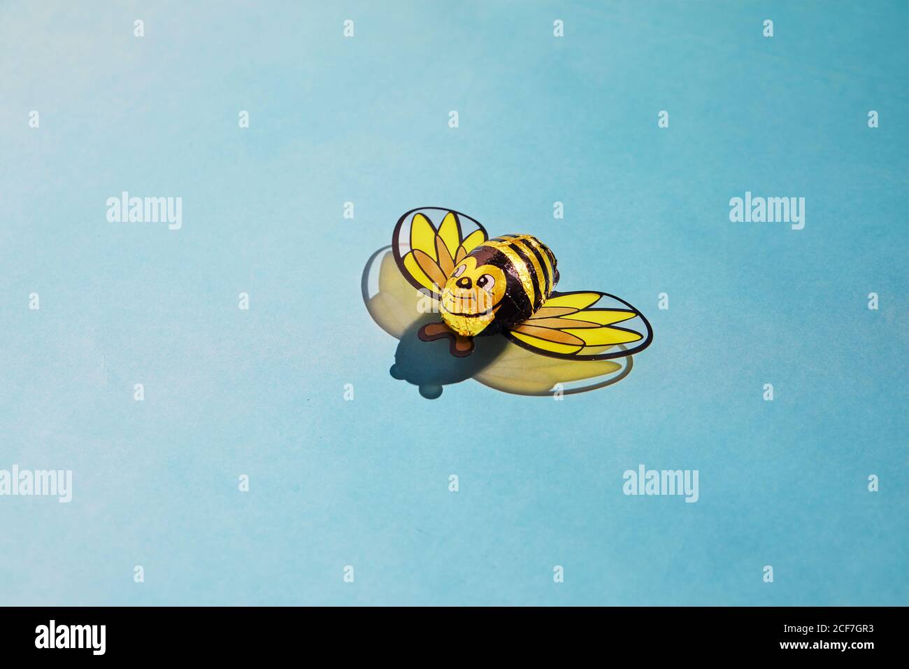 Candy cane bee with shadow. The concept of the Rosh Hashanah holiday ...