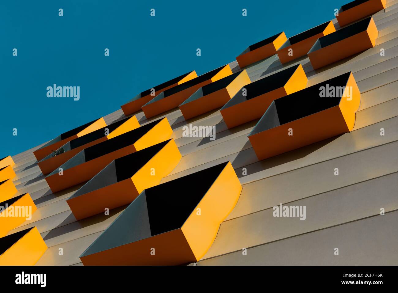 From below gray wall of contemporary commercial building with popped ...