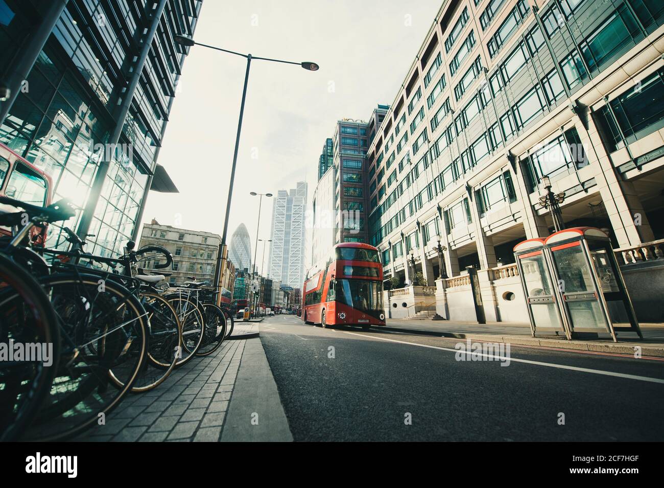 Red bus on city street Stock Photo - Alamy