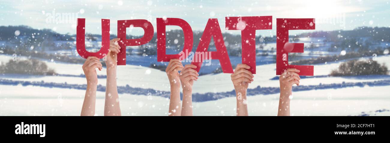 People Hands Holding Word Update, Snowy Winter Background Stock Photo ...