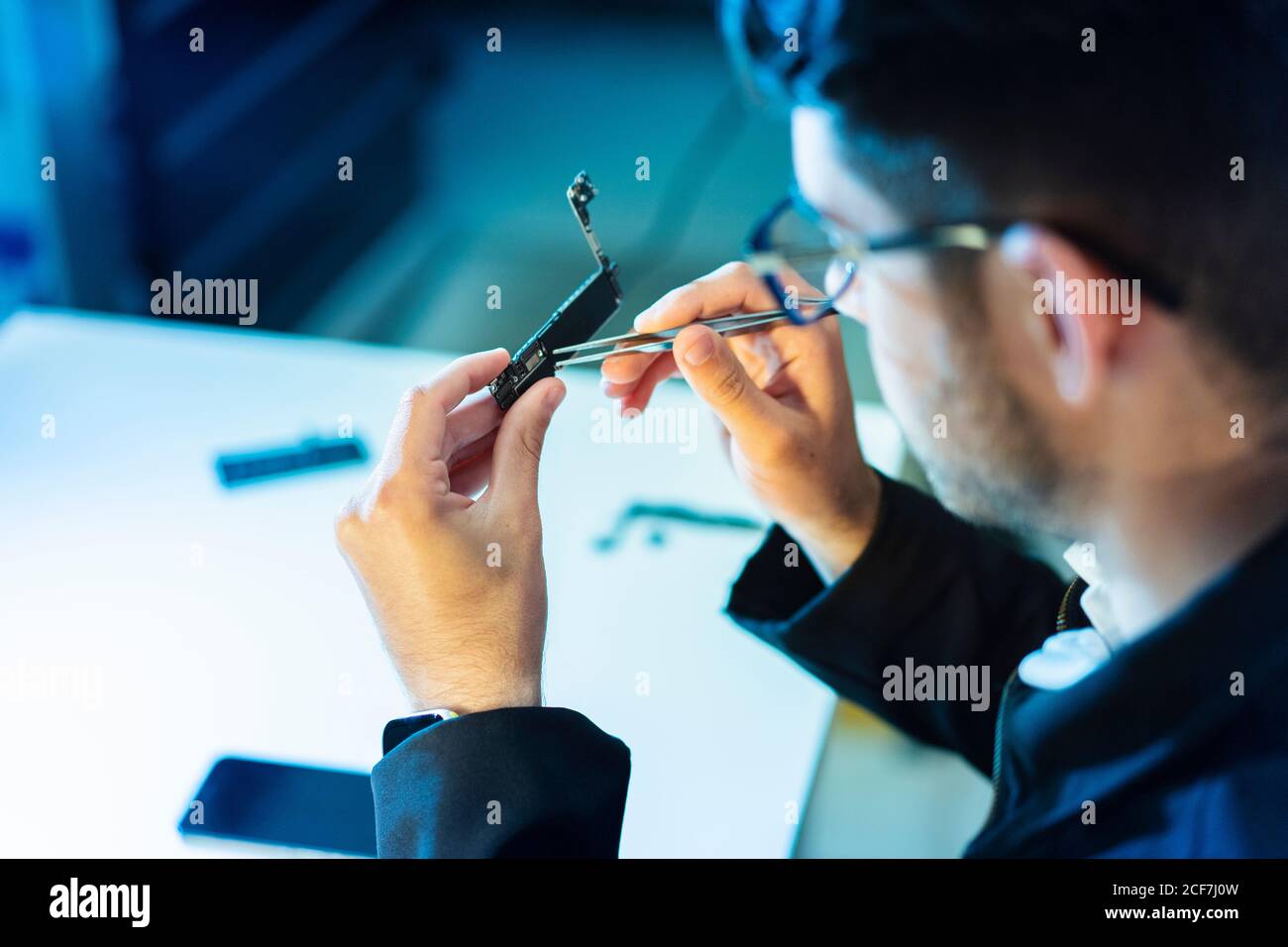 Concentrated professional man repairing hi-res stock photography and ...