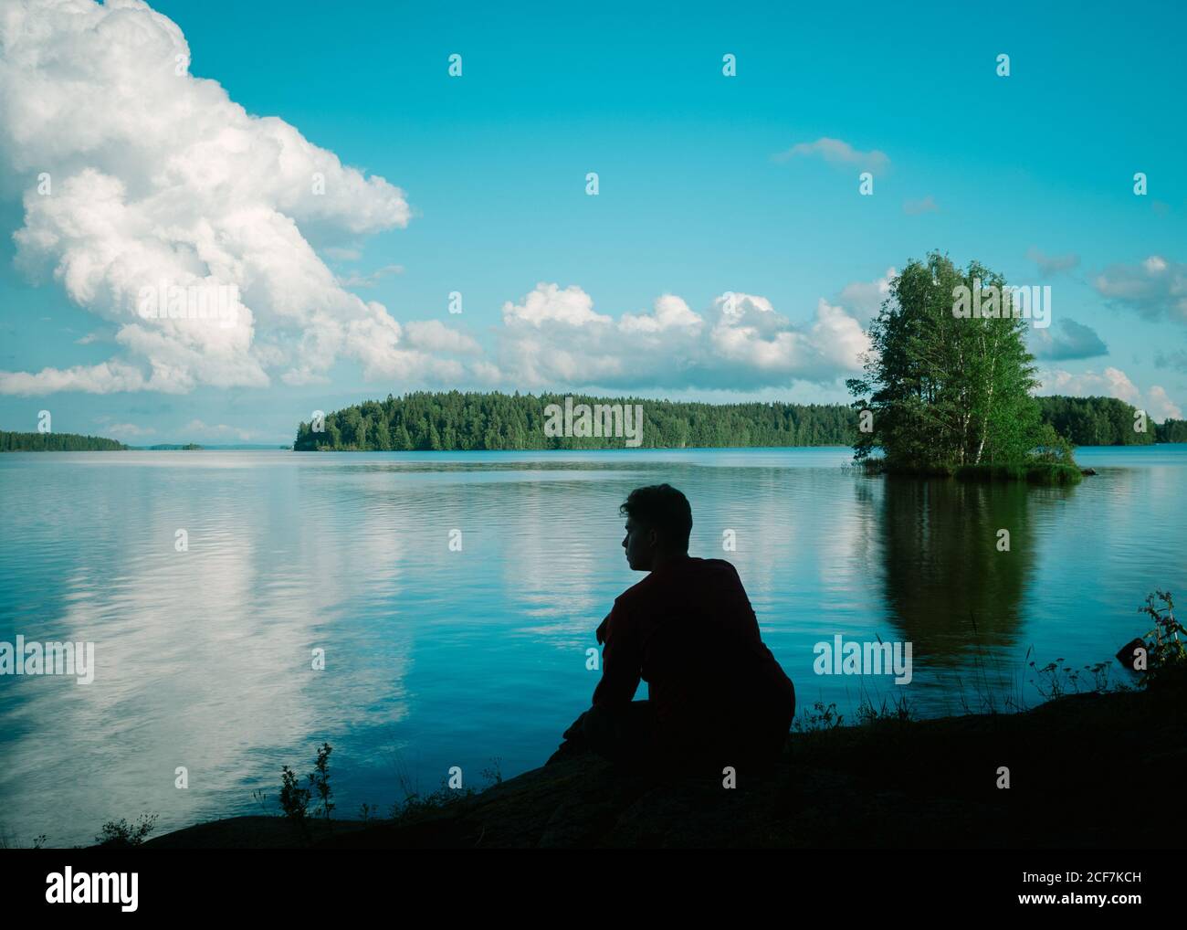 Sitting in shadow hi-res stock photography and images - Alamy