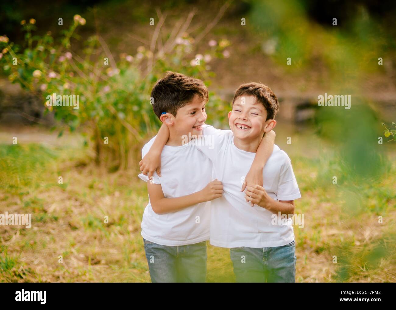 Boys hugging hi-res stock photography and images - Alamy