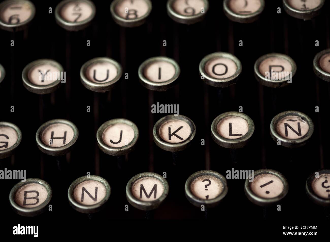 High angle of old fashioned typewriter with keys with letters and ...