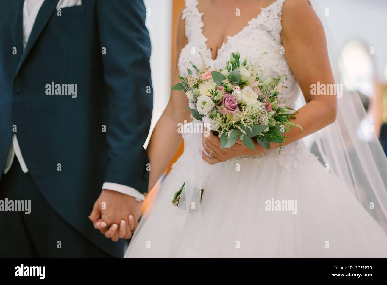 unrecognizable crop groom in classy tuxedo and bride in elegant wedding ...