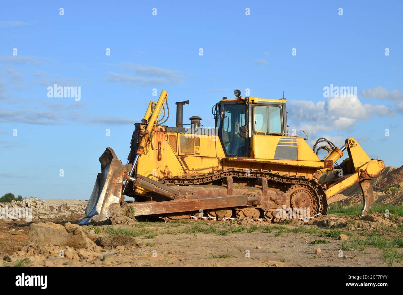 Bulldozer with bucket for pool excavation and utility trenching. Dozer ...